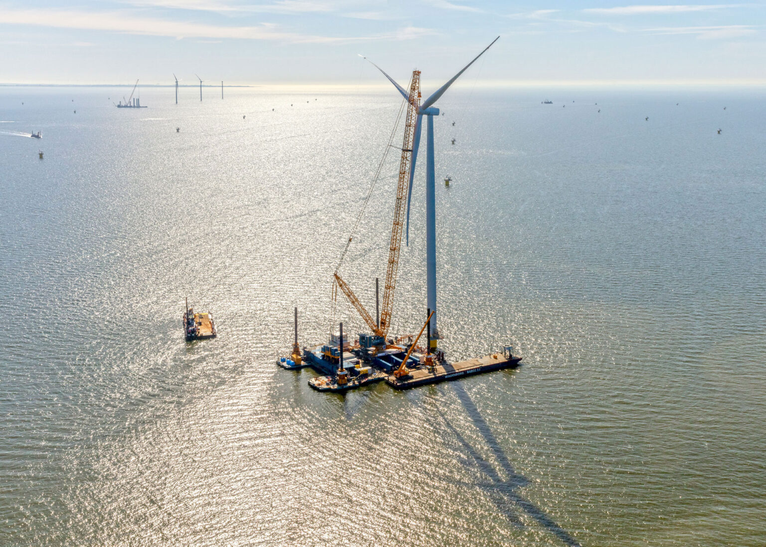 C7 spudwell sets to stabilize barge for WTG installation works in lake ...